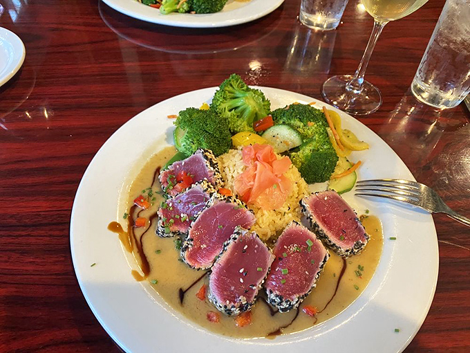 Sesame-crusted tuna arranged like a color wheel of deliciousness—the kind of plate that makes everyone at neighboring tables ask, "What is THAT?"