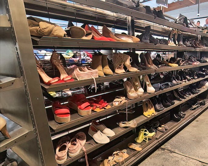 The shoe section: a footwear fantasy where designer heels mingle democratically with practical flats, all waiting for their Cinderella moment.