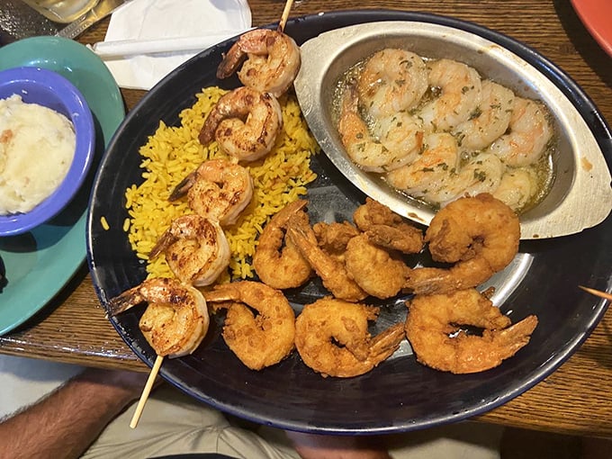 Grilled shrimp skewers and fried companions create a surf-and-surf situation that nobody's complaining about.