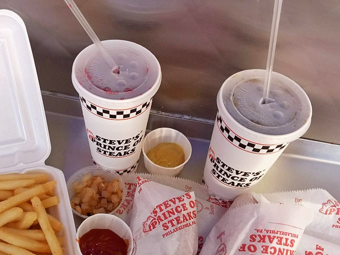 The full spread—where plastic cups of soda stand guard over a feast fit for Philly royalty.