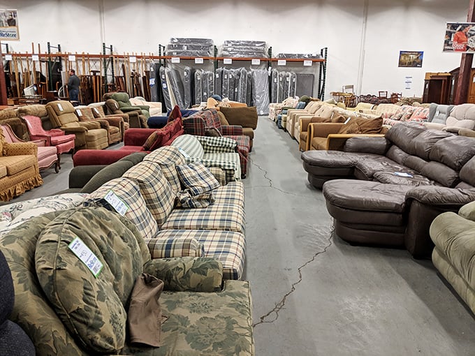 The sofa section: where you can test-sit your way through decades of comfort technology. That brown recliner has "afternoon nap" written all over it.