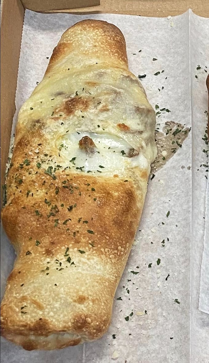A stromboli rolled tighter than my jeans after Thanksgiving – and worth every glorious bite.