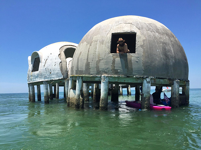 Curious explorers get a closer look at what was once someone's visionary vacation home—now Florida's most photogenic monument to coastal change.