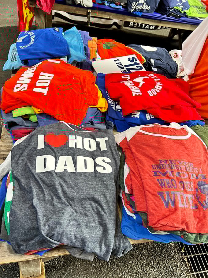 T-shirt philosophy 101: Where "I Love Hot Dads" shares table space with profound statements about wine, creating the perfect wardrobe for life's important occasions.