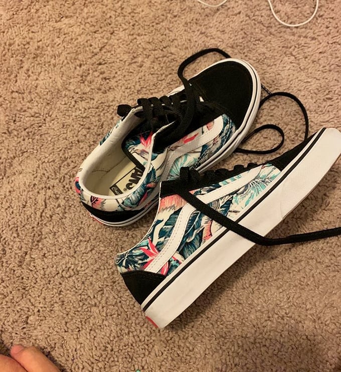 Floral Vans that scream "summer adventure" at winter clearance prices—fashion math at its finest!