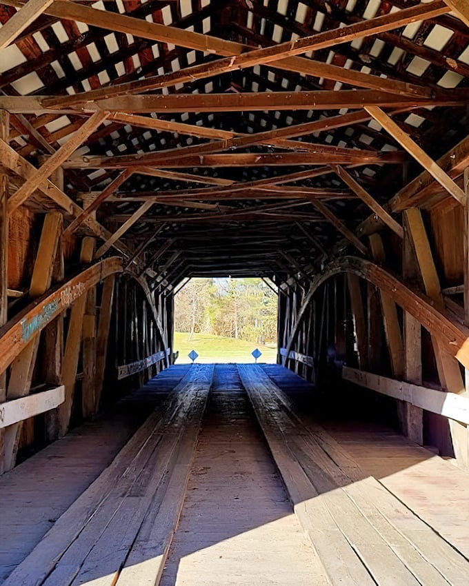 Looking up reveals the architectural poetry of necessity—each beam and brace a line in an engineering sonnet from another century.