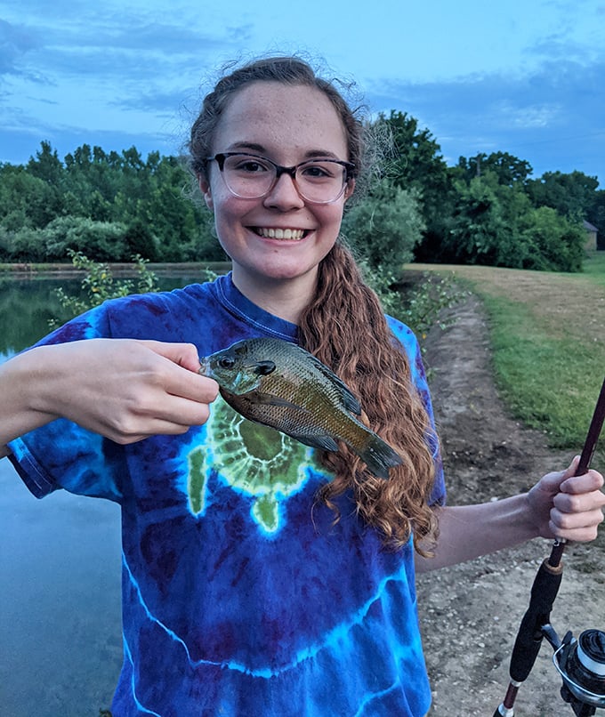 The true measure of a successful fishing trip isn't always size – it's the smile that comes with the catch.