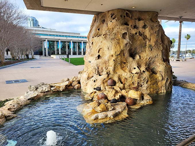 This fountain sculpture looks like Swiss cheese had an existential crisis and decided to become art.