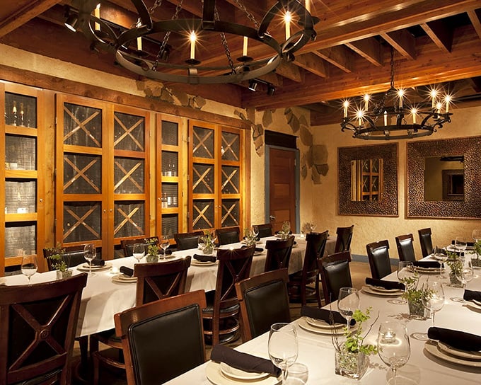 The private dining room feels like you've stumbled into a Napa Valley wine cellar – elegant, intimate, and ready for celebration.