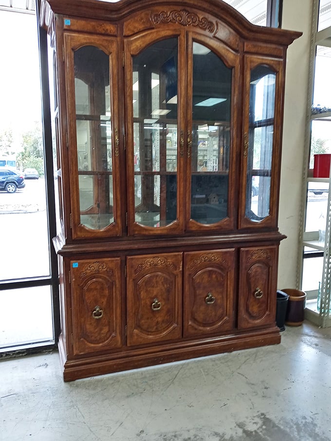 This ornate china cabinet isn't just furniture—it's a time machine to Sunday dinners at Grandma's house.