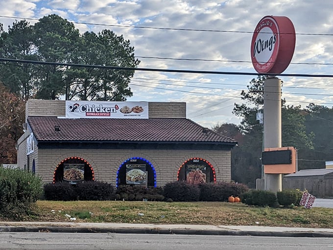 Those colorful lit arches aren't just for show—they're your gateway to Korean double-fried chicken heaven at 92 Chicken.