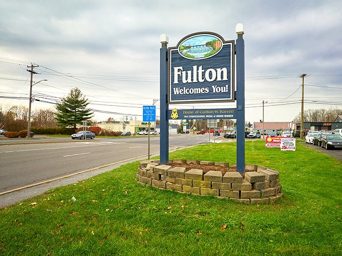 Fulton's welcome sign greets visitors with promises of small-town hospitality. Where your dollar stretches and your smile widens!
