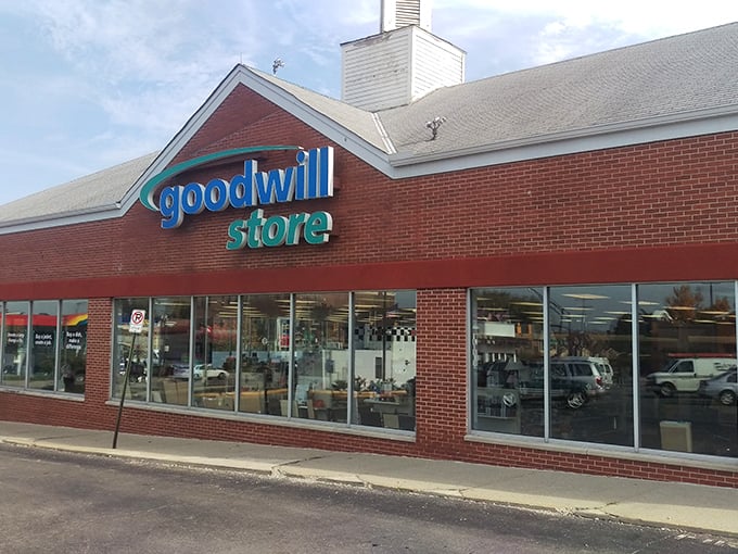 The familiar Goodwill smile logo welcomes shoppers to Columbus's treasure-filled brick building.
