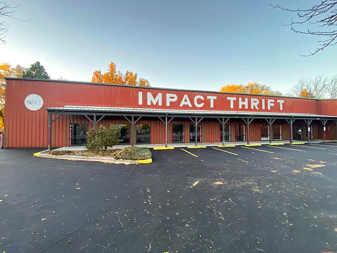 Impact Thrift's rustic red exterior stands out against autumn foliage—a barn-like treasure trove of secondhand delights.
