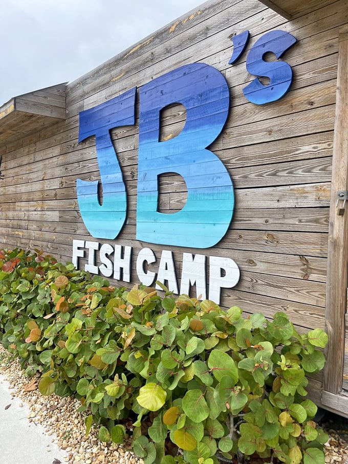 JB's wooden sign with its ocean-blue gradient is like a gentle wave beckoning seafood lovers to come ashore.