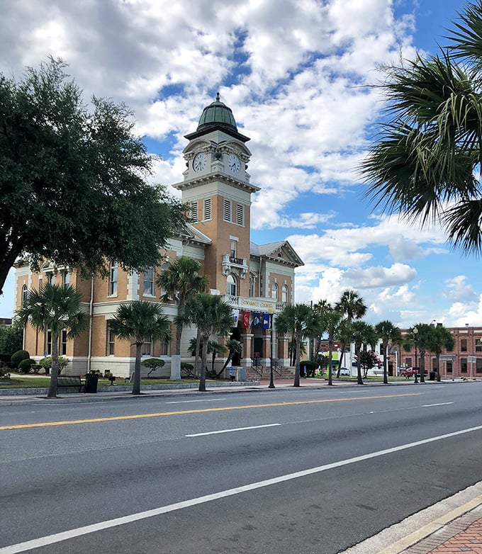 Live Oak's courthouse clock tower keeps time while palm trees sway to their own rhythm—Florida's version of "time is just a suggestion."