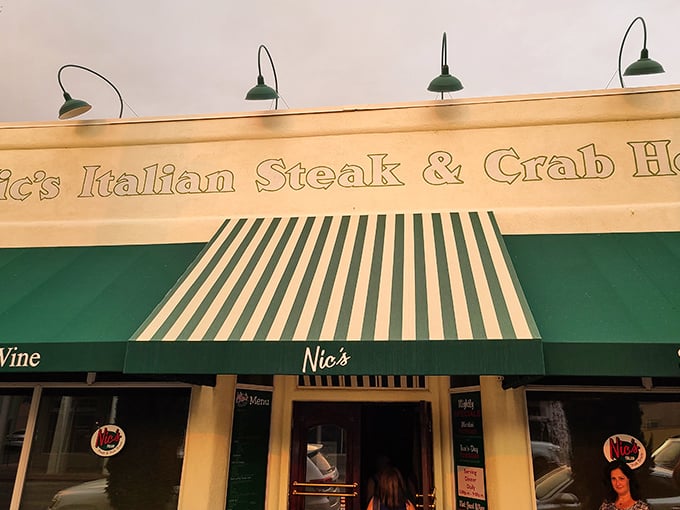 Nic's green-and-white awning is like the opening credits to a blockbuster meal—setting the stage for Italian-influenced steak stardom.