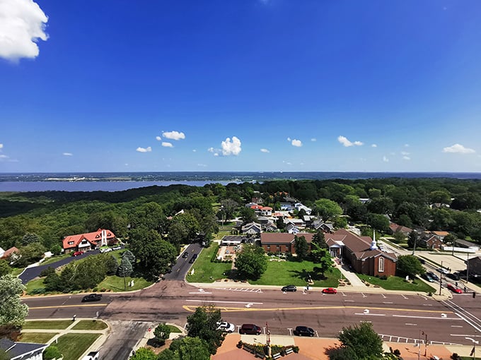 An aerial view reveals Peoria's perfect balance of residential neighborhoods and natural beauty, with water visible in the distance.