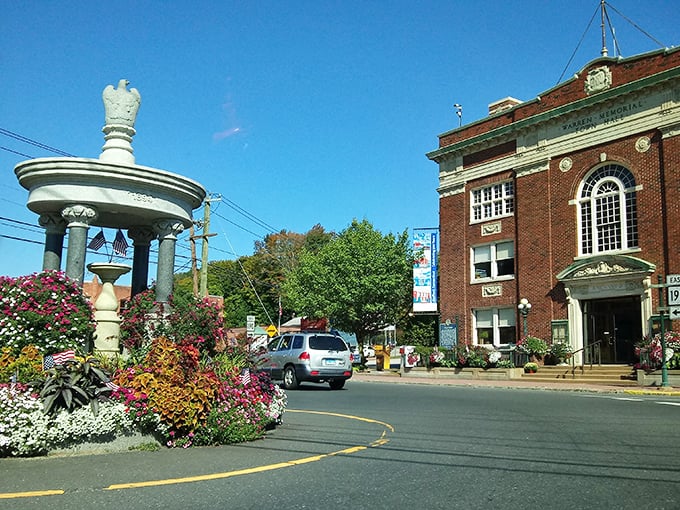 Stafford's flower-festooned memorial circle – where small-town charm and "Gilmore Girls" vibes come with housing costs that won't break the bank.
