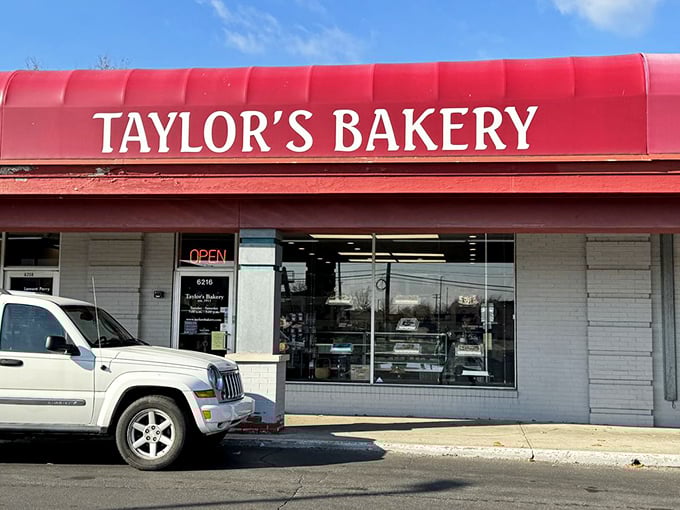 Taylor's red awning waves like a flag of surrender to anyone trying to resist donuts.
