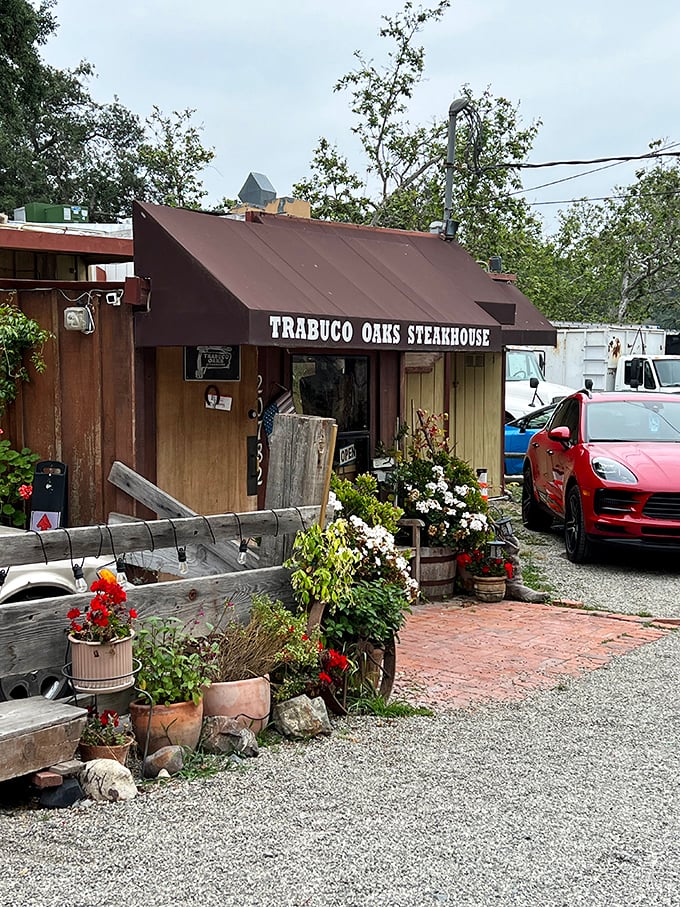 Trabuco Oaks' flower-lined entrance feels like discovering a secret garden—except the treasure is perfectly grilled beef.