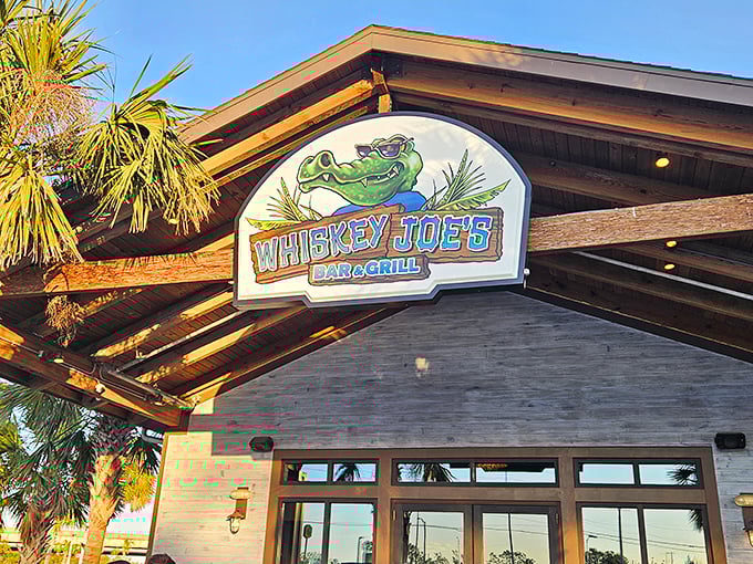 Whiskey Joe's alligator mascot isn't just cute – he's guarding some of the best waterfront grouper sandwiches in Florida.