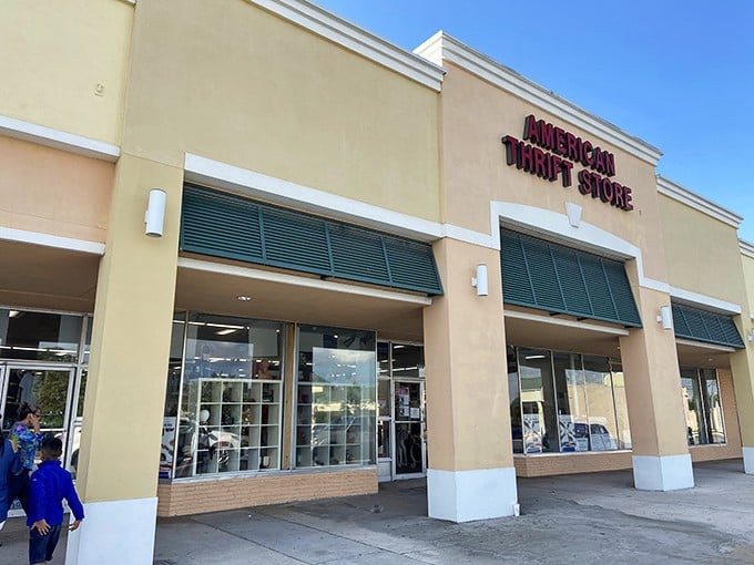 That peachy exterior and professional signage suggest this isn't your grandmother's dusty thrift shop.