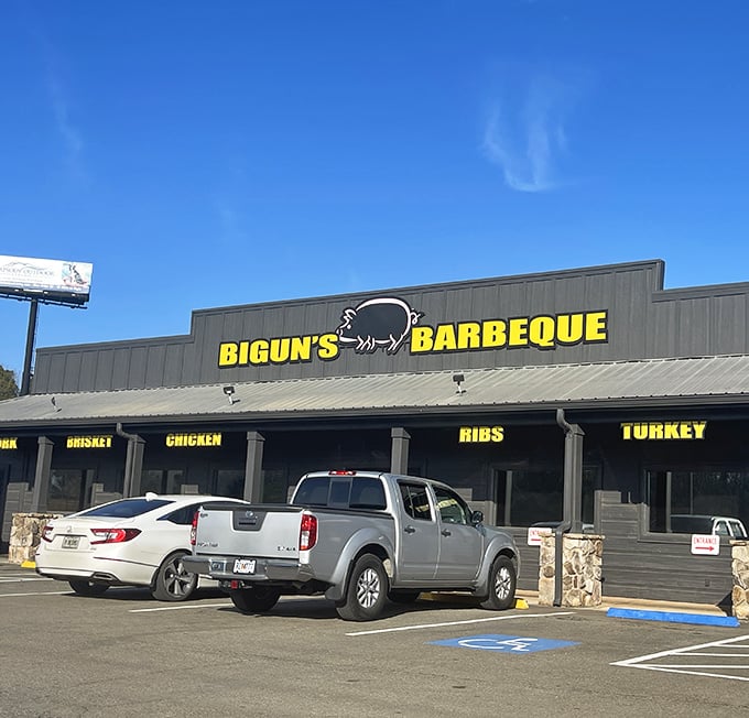 Big flavors deserve big signs, and this roadside gem delivers both with small-town hospitality and championship-worthy ribs.