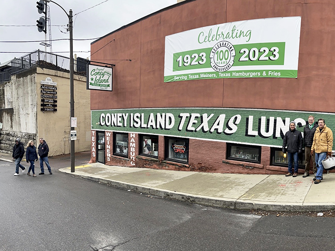 Green and white storefront simplicity that lets the food do all the talking – smart approach.