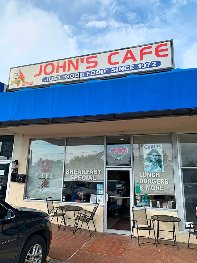 The timeless appeal of John's Cafe shows in every detail - from the classic signage to the satisfied customers.
