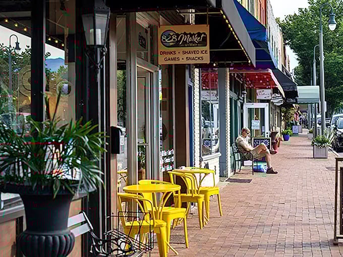 Here's where small-town charm meets serious flavor—yellow chairs beckon like sunshine inviting you to stay awhile longer.
