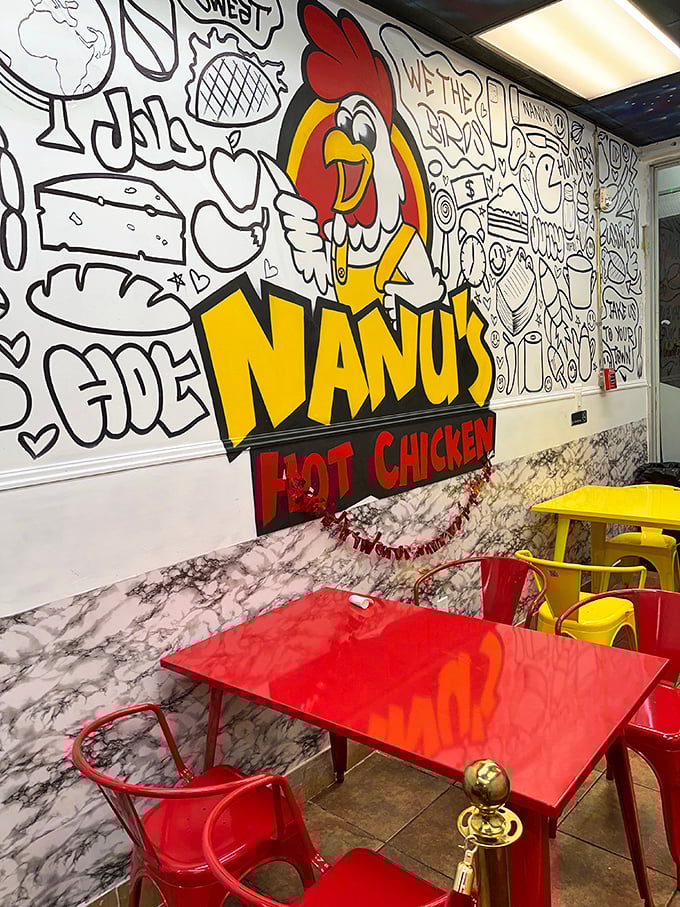 The playful interior at Nanu's belies the serious chicken business happening here. Those red and yellow chairs match the fire on your plate!
