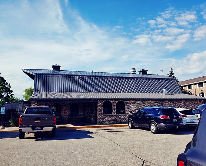 The distinctive roofline of Oscar's stands out like a delicious landmark. Where custard dreams come true under a metal sky.