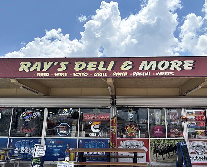 The sign promises beer, wine, and everything fine – a convenience store that took a delicious detour into serious sandwich territory.