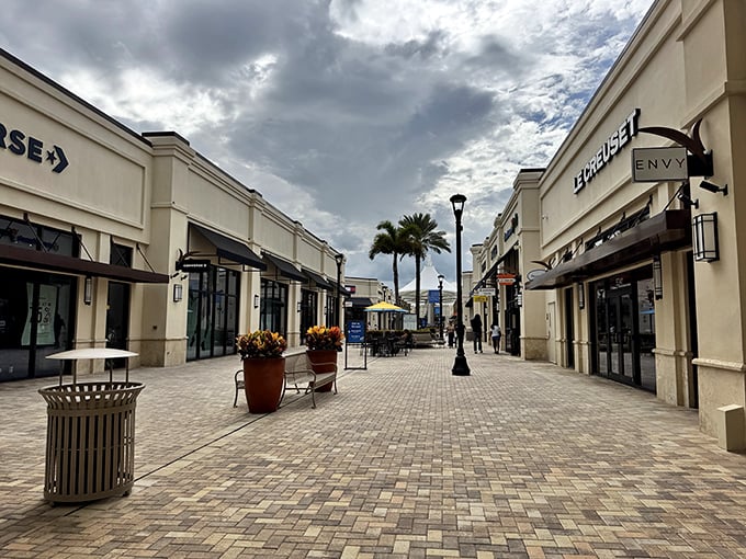 Wide walkways and coastal colors make this feel more like a resort than a retail therapy session.