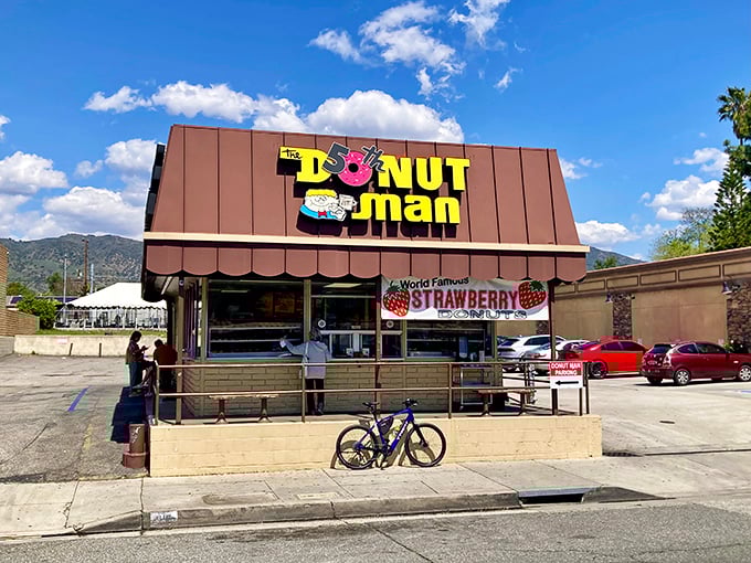 The Donut Man's humble exterior hides legendary status – like Clark Kent in a phone booth.