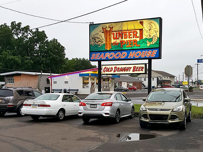 That neon-splashed sign and no-frills lot set the stage for a seafood house that’s all about hearty plates and unpretentious flavor.