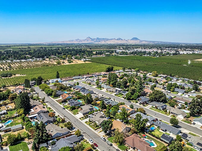 Suburban serenity meets agricultural abundance - where your neighbors might include both retirees and fruit trees.
