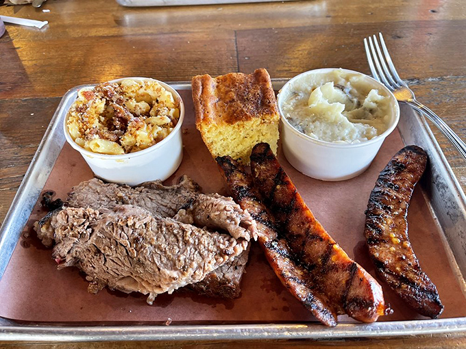 The two-meat platter: when making decisions is too hard and FOMO is real. That cornbread isn't just a side—it's an edible napkin.