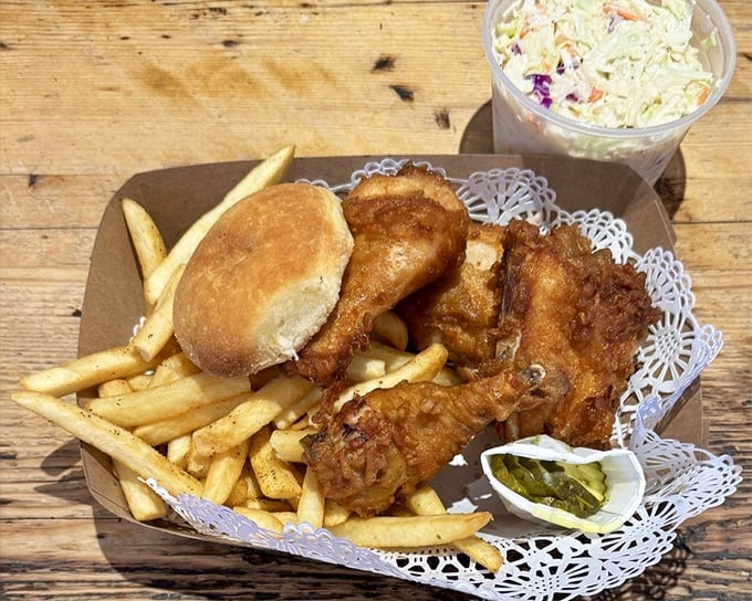 A feast fit for royalty but priced for mere mortals. Golden chicken, crispy fries, and that biscuit—oh, that biscuit!