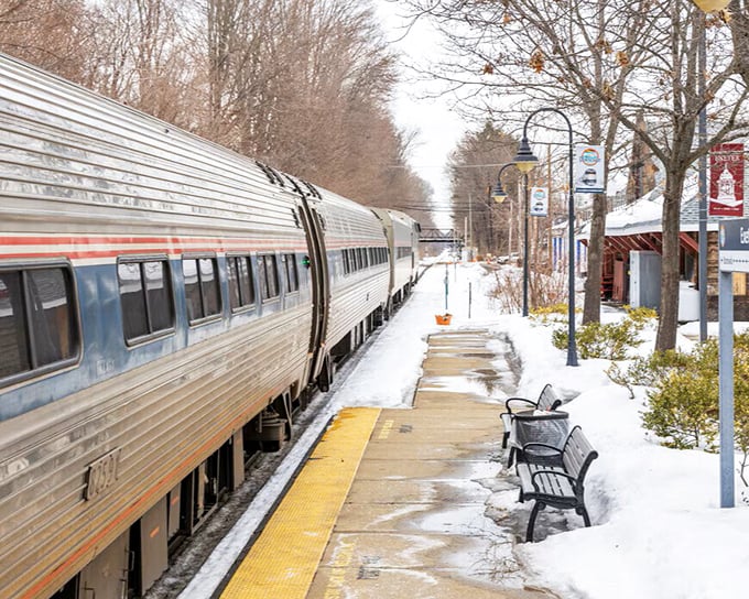 The silver streak of the Amtrak Downeaster glides alongside Exeter's platform, a modern convenience nestled into a setting that honors its historical roots.