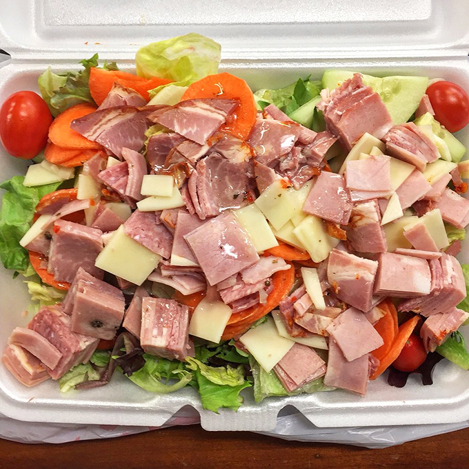 An antipasto salad that's basically Italy on a plate – a colorful mosaic of meats, cheese, and vegetables playing the most delicious game of Tetris.