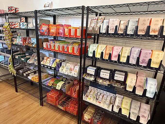 Shelves lined with chocolate bars from around the world—like a delicious library where you're encouraged to judge each book by its wrapper.