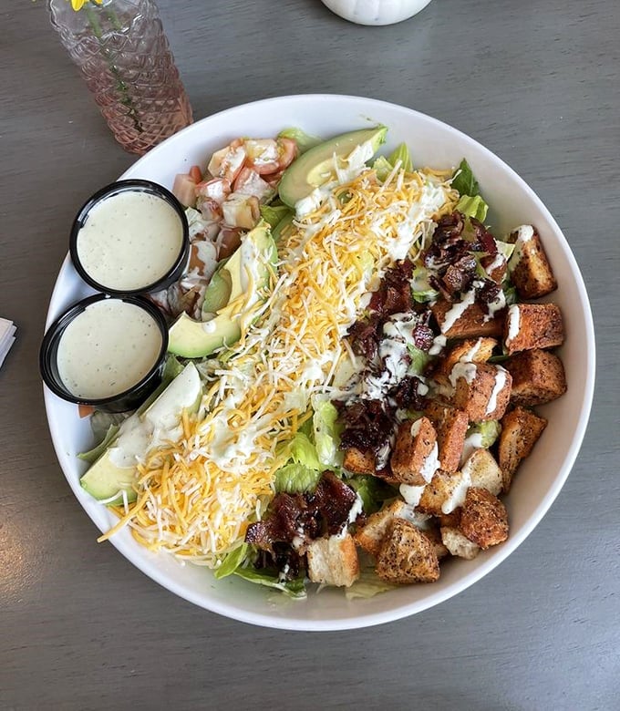 This isn't just a salad—it's a carefully constructed landscape of textures and flavors where even the croutons deserve their own fan club.