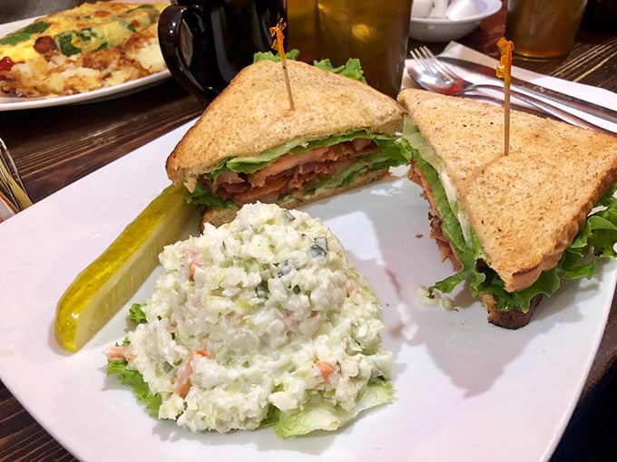 A sandwich that understands the importance of architecture—layers of flavor held together with toothpick engineering.