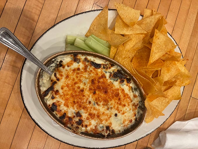 Bubbling cheese dip that whispers, "Diet tomorrow." Paired with crispy tortilla chips, it's the appetizer that ruins appetites—in the best possible way.