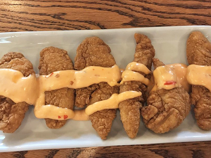 Bang Bang Chicken that lives up to its name—crispy tenders drizzled with that signature sauce that makes you wonder why you'd eat chicken any other way.