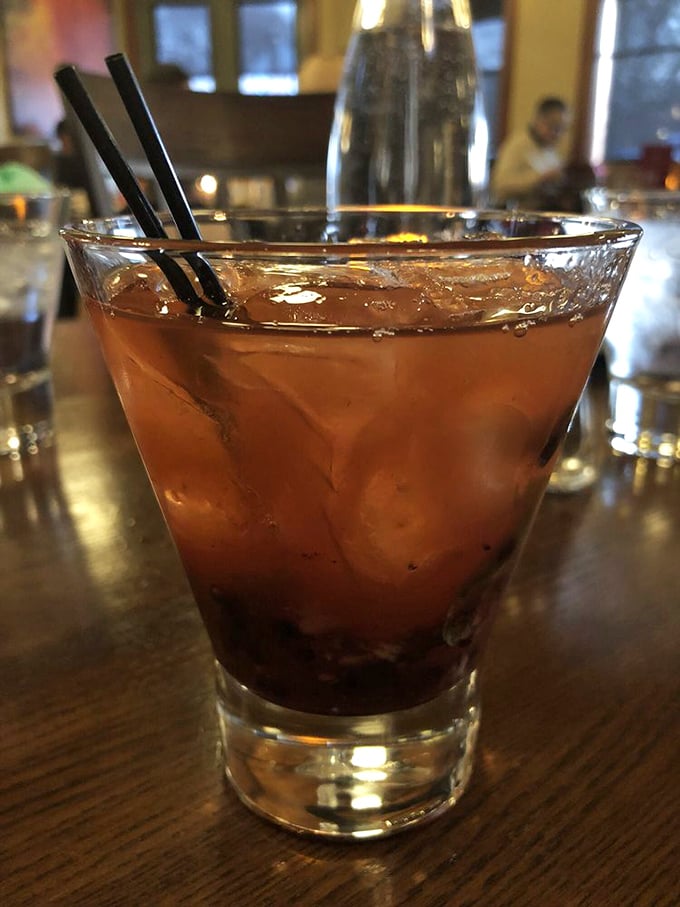 Not just a cocktail but a liquid sunset in a glass—the kind that makes you forget you're in Pennsylvania and not watching waves crash on some distant shore.
