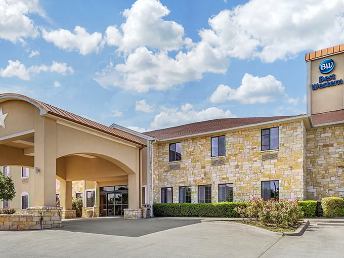The Best Western offers Texas-sized hospitality with its stone facade and convenient location, proving small towns can deliver big comfort to weary travelers.