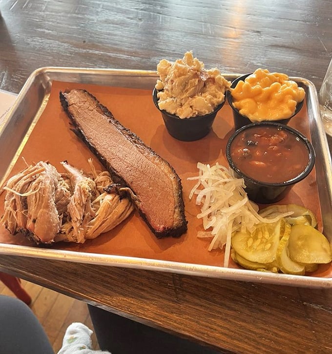 Two meats, multiple sides – this tray contains more happiness per square inch than a puppy convention.